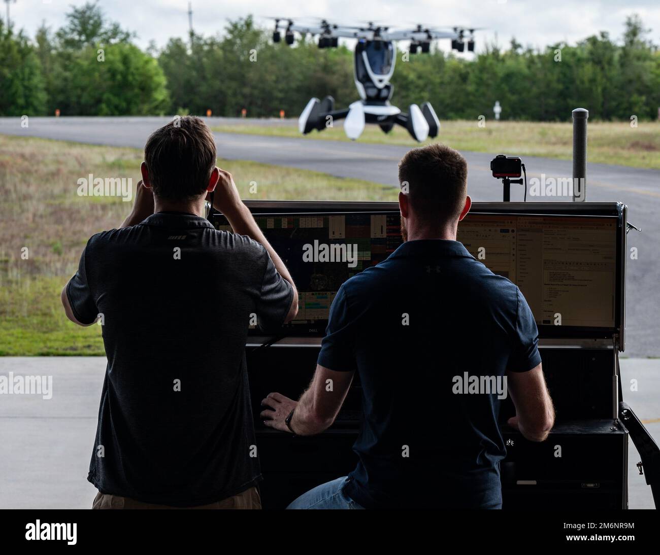 Brad Bollig (left), ground station operator from Lift Aircraft, and ...