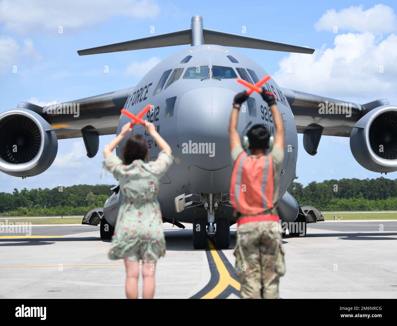 A 437th Airlift Wing maintenance Airman and Jessica Reagan, wife of U.S ...