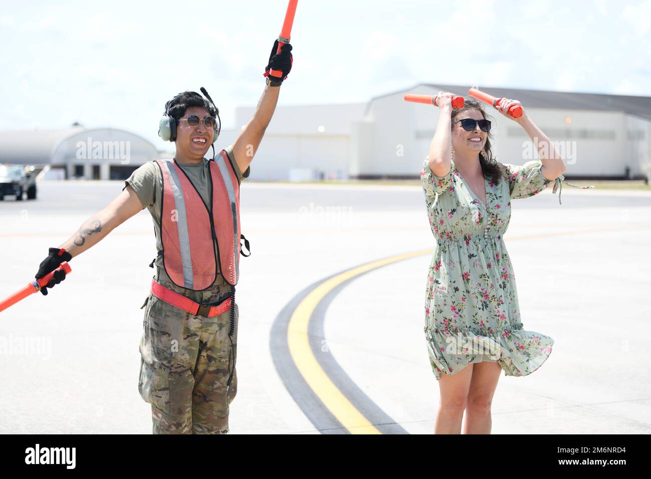 A 437th Airlift Wing maintenance Airman and Jessica Reagan, wife of U.S ...
