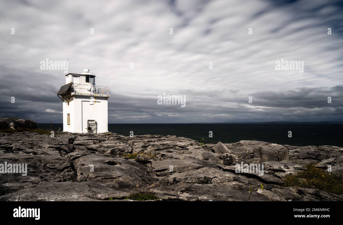 View of the Black Head Lighthouse on the Burren Coast of County Clare ...