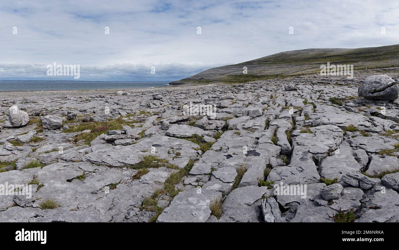 Panorama view of the glaciokarst coastal landscape of the Burren Coast ...