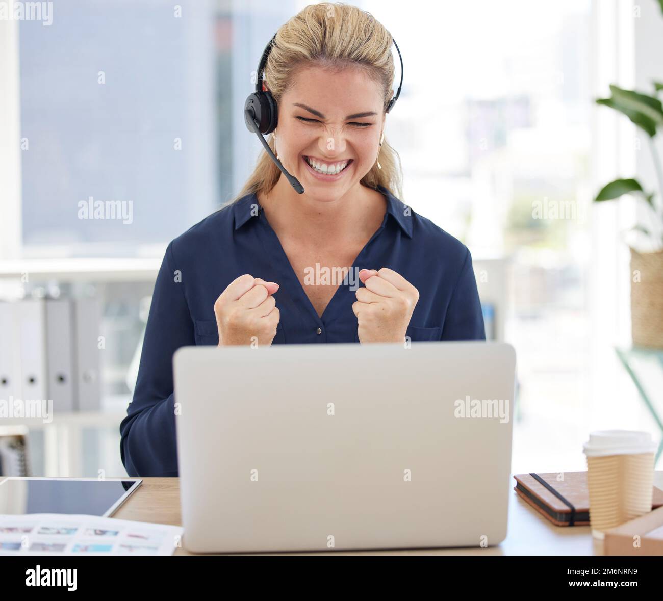 Call center, laptop and winner woman with fist for success, yes and ...