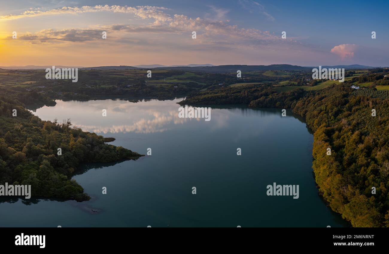 View of Castlehaven Bay and Rineen Woods in West Cork in warm evening ...
