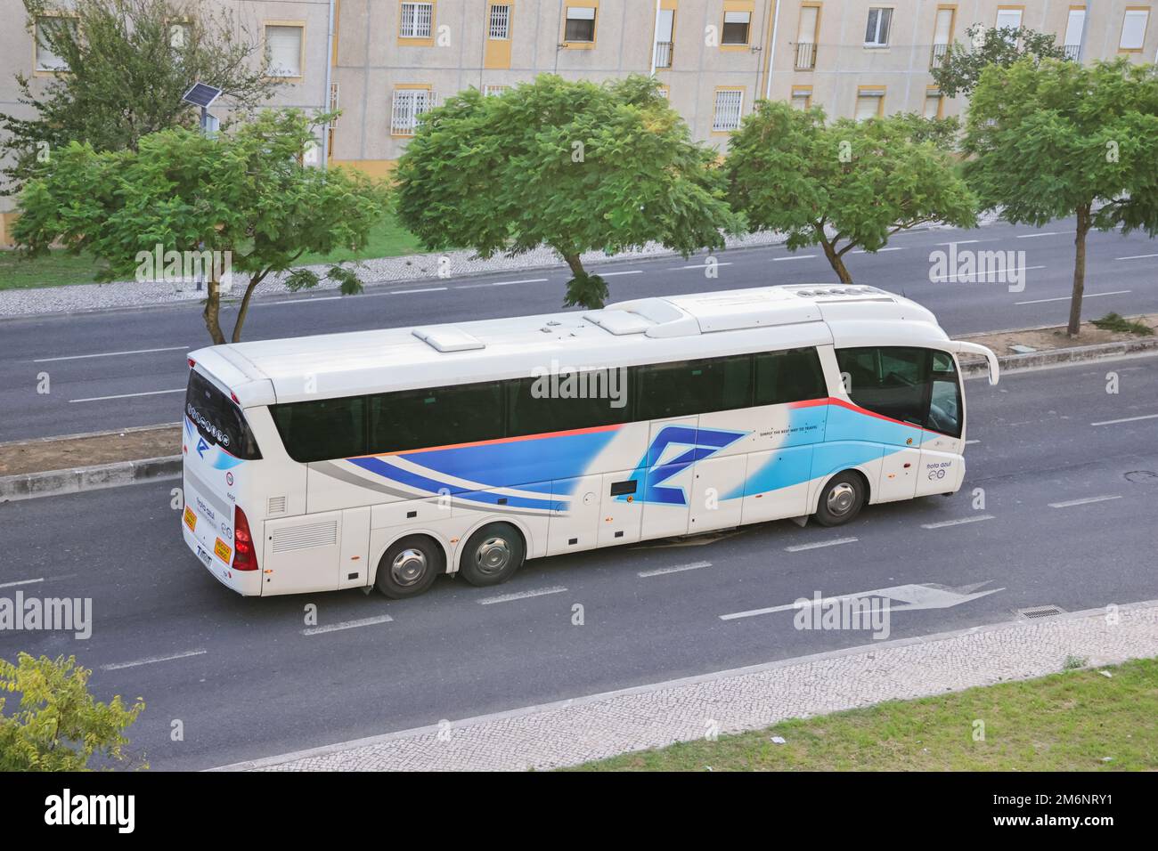 A tourist bus of the Frota azul company driving on the streets of ...
