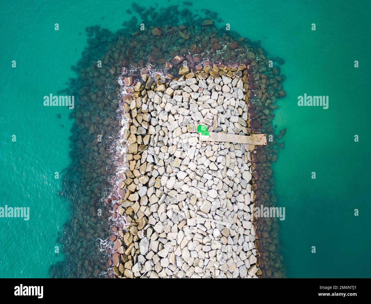 An aerial view of a pier made of stones Stock Photo - Alamy