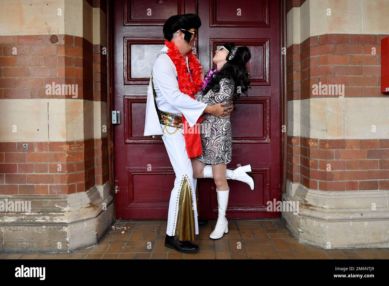 Peter Dance (left) and Karen Cerna pose for a photograph dressed as ...