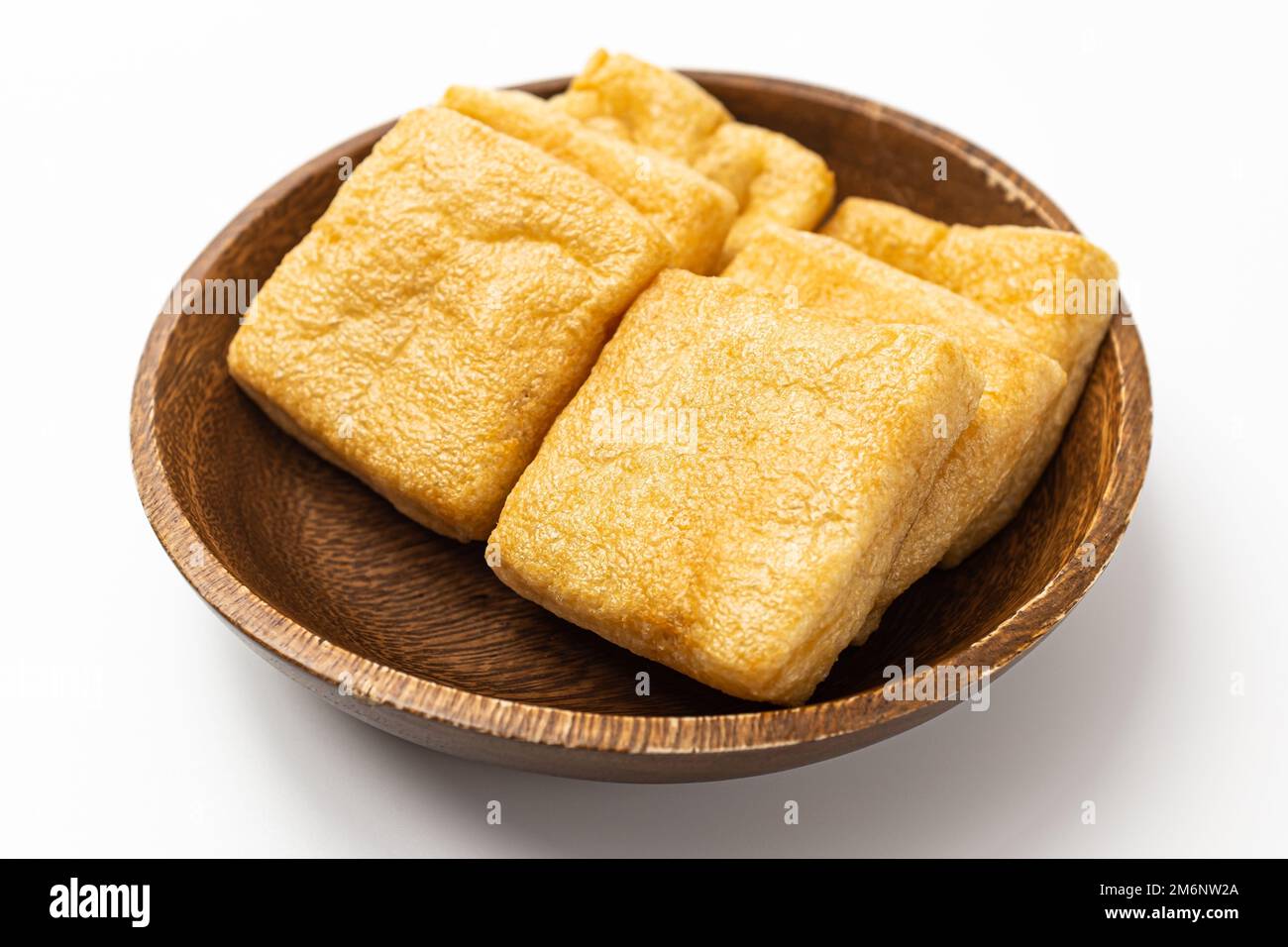 square fried tofu on a white background Stock Photo - Alamy