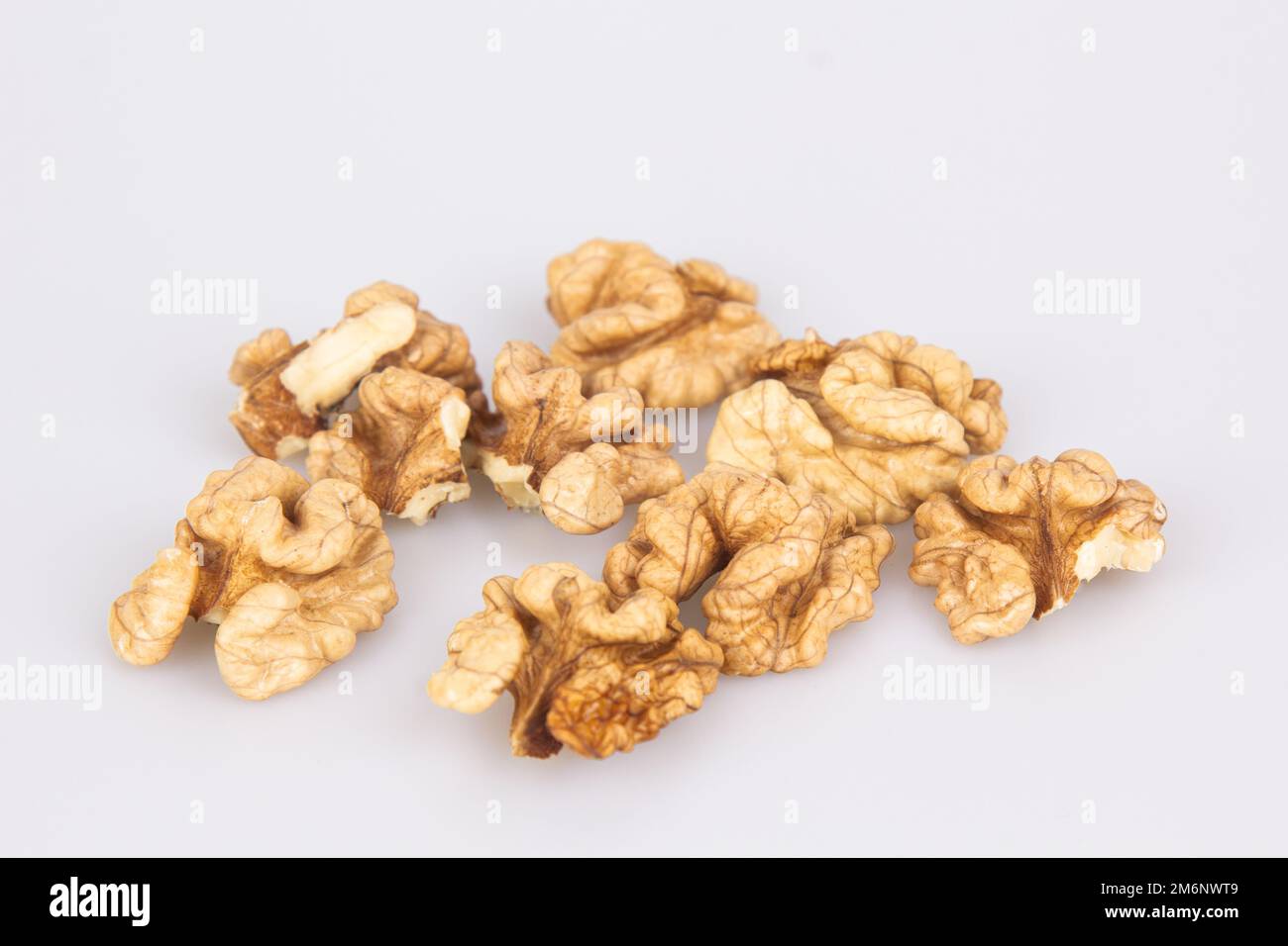 Half a walnut isolate. Peeled walnut on white. Walnut top view. Set ...