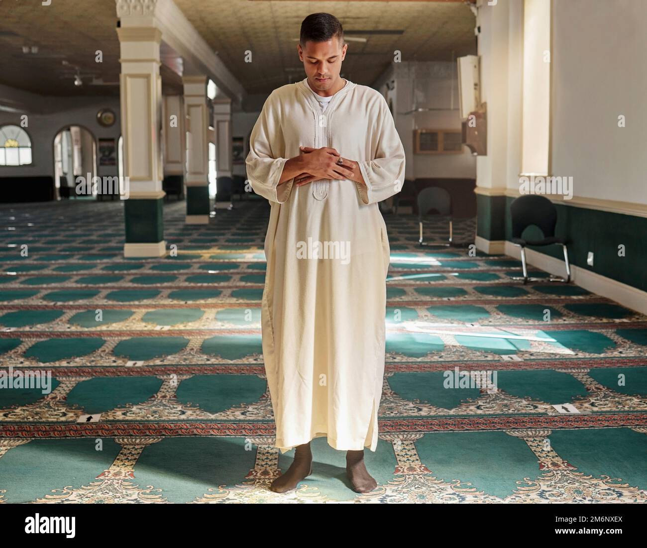 Man, muslim faith and praying in mosque for God, peace and mindfulness ...