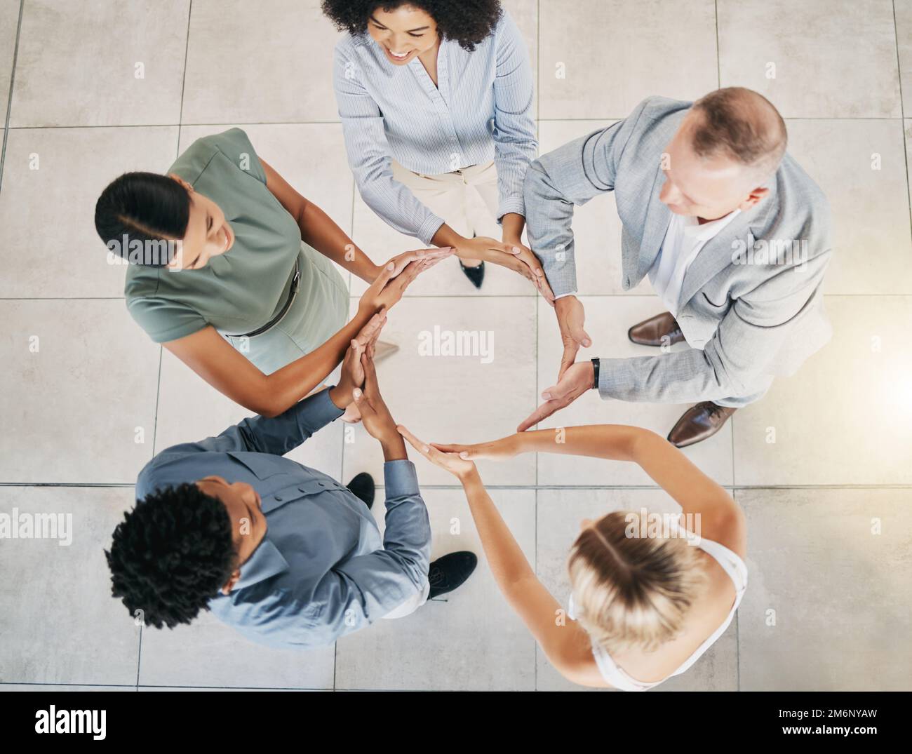 Top view, business people or circle hands in collaboration, diversity team building or financial ...