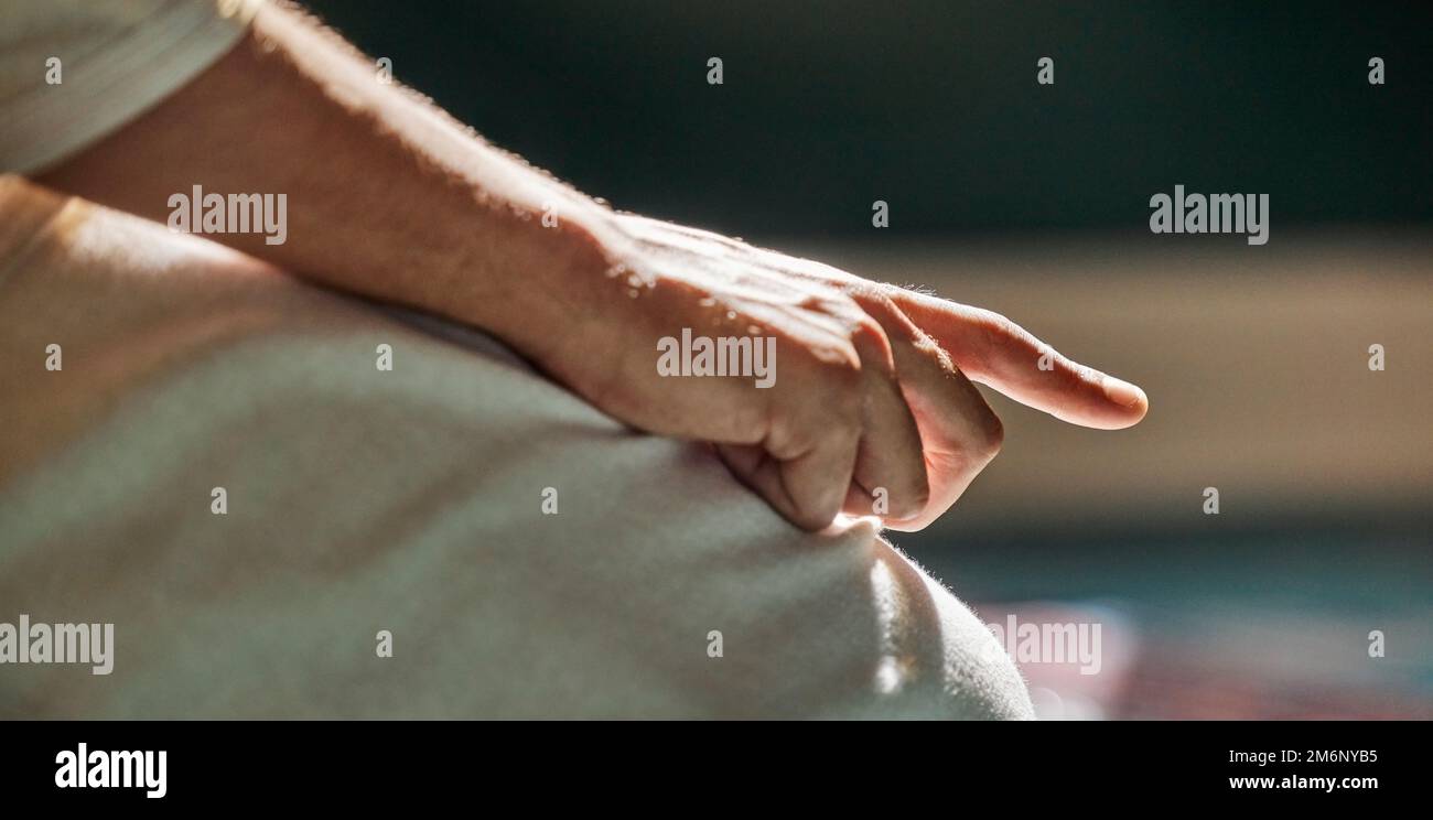 Hand, religion and islam with a muslim man in a mosque to pray in faith ...