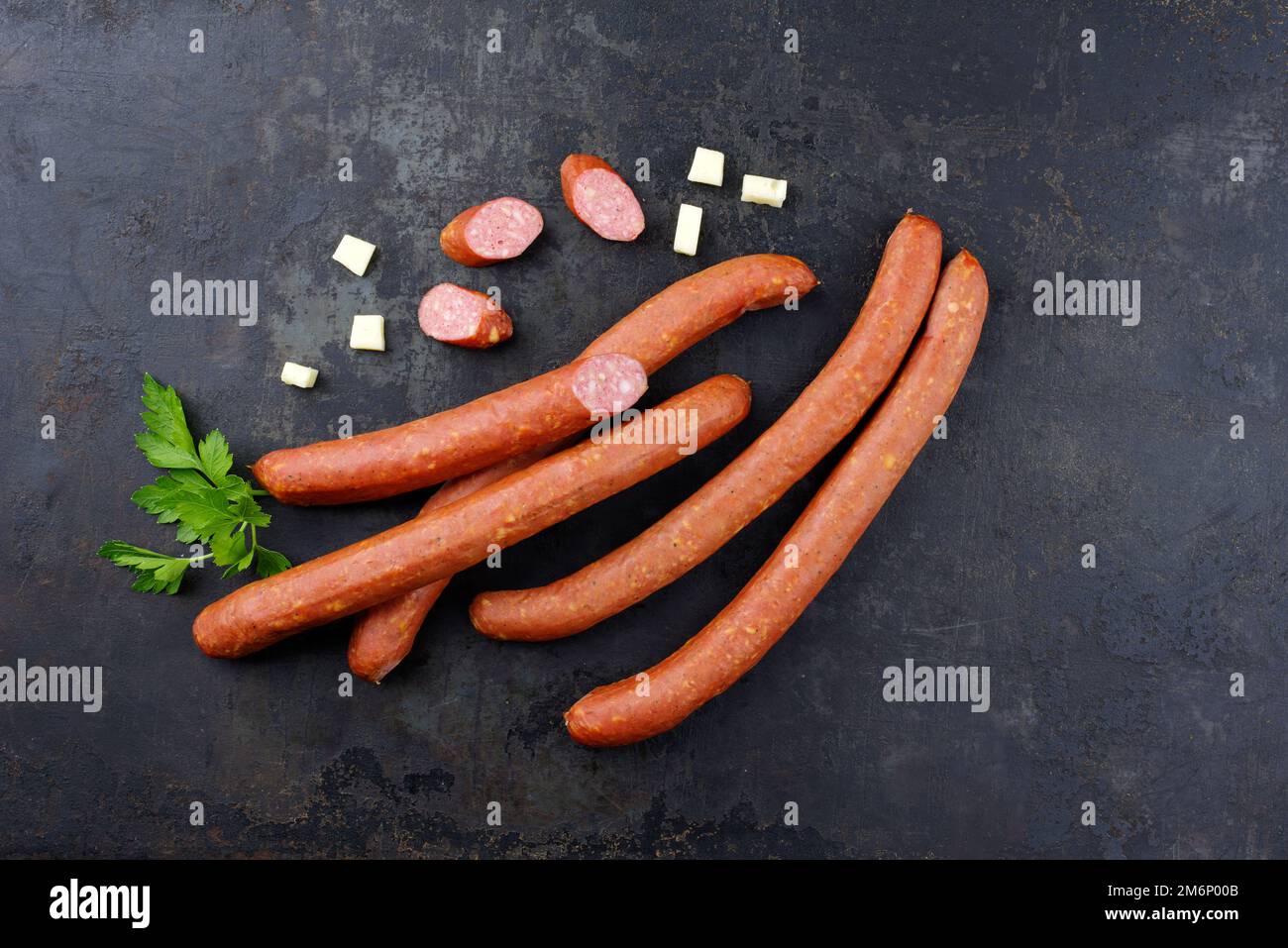 Traditional raw Austrian fine cheese sausage with cheese offered as top ...