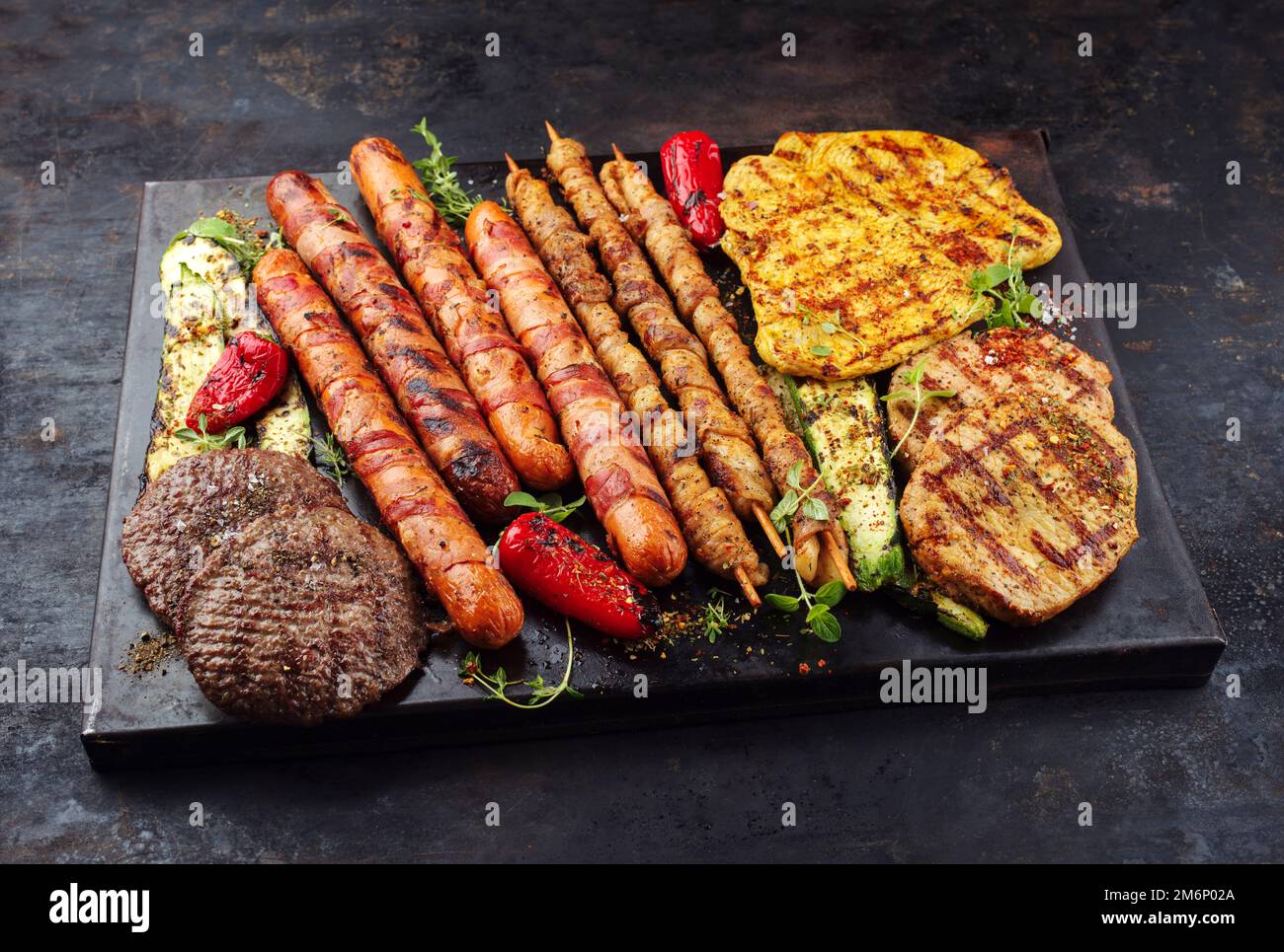 Traditional grill platter with bratwurst Stock Photo - Alamy