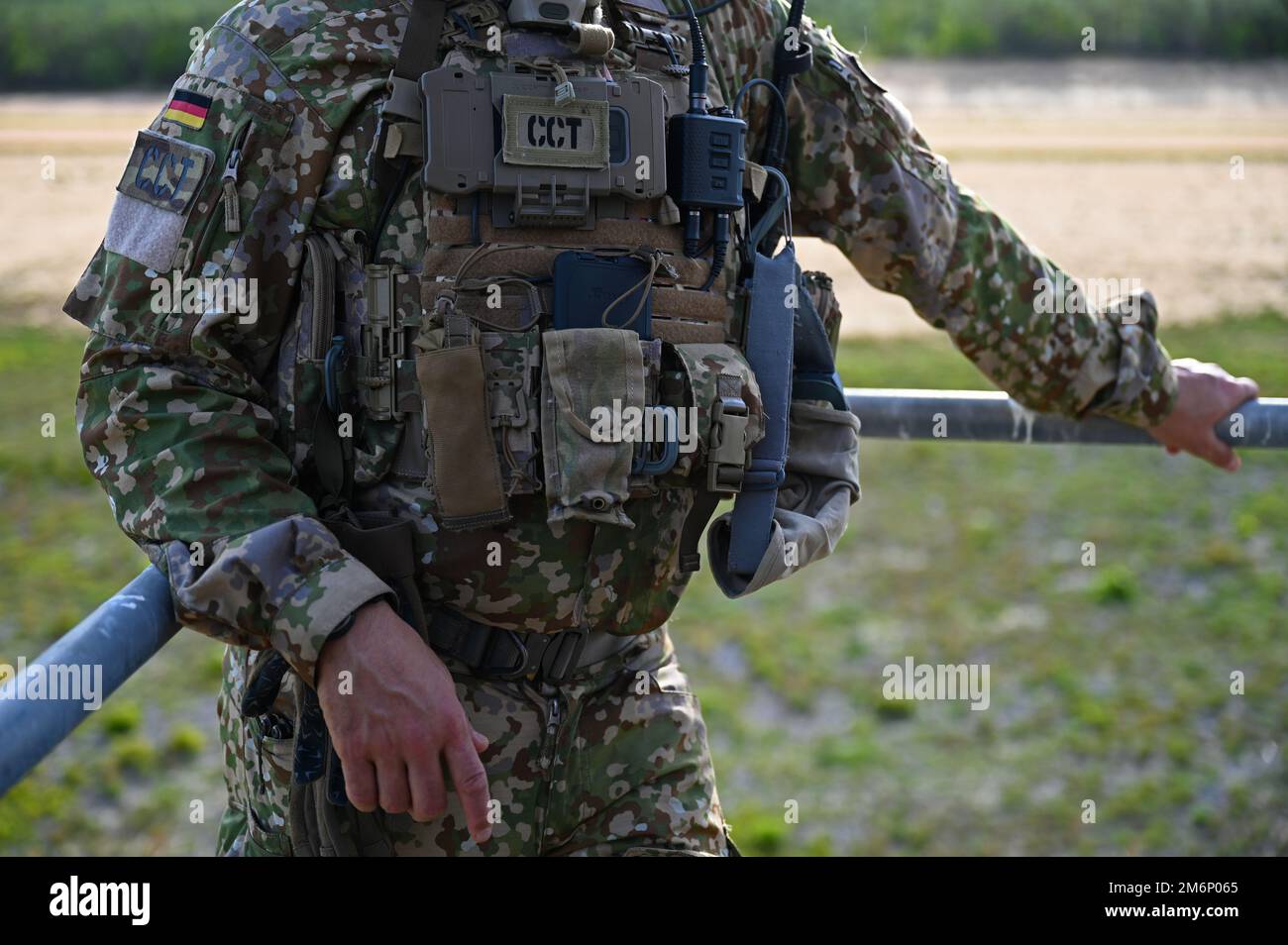 A combat controller with the German Army combat controller conducts ...