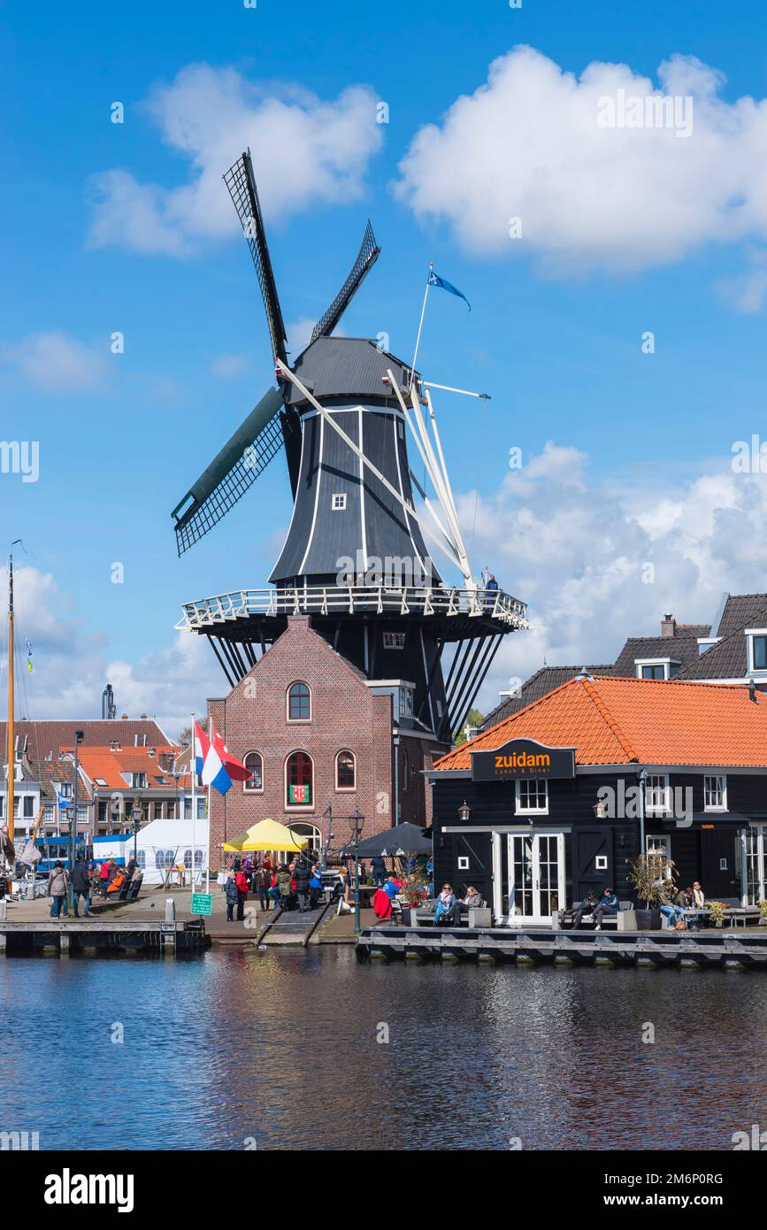 De Adriaan windmill along the river Spaarne, Haarlem, The Netherlands ...