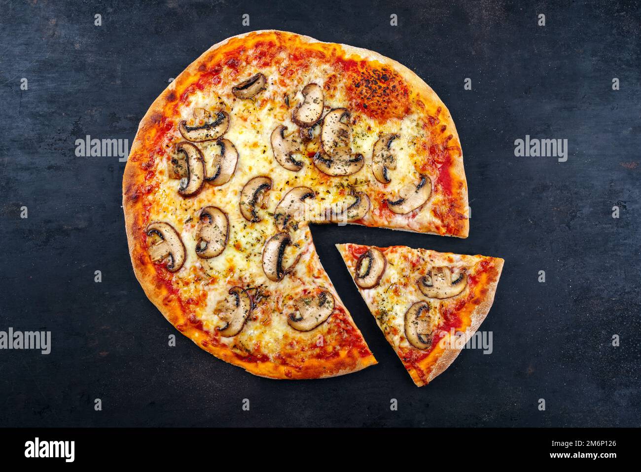 Traditional Italian pizza funghi with mushrooms and mozzarella served ...