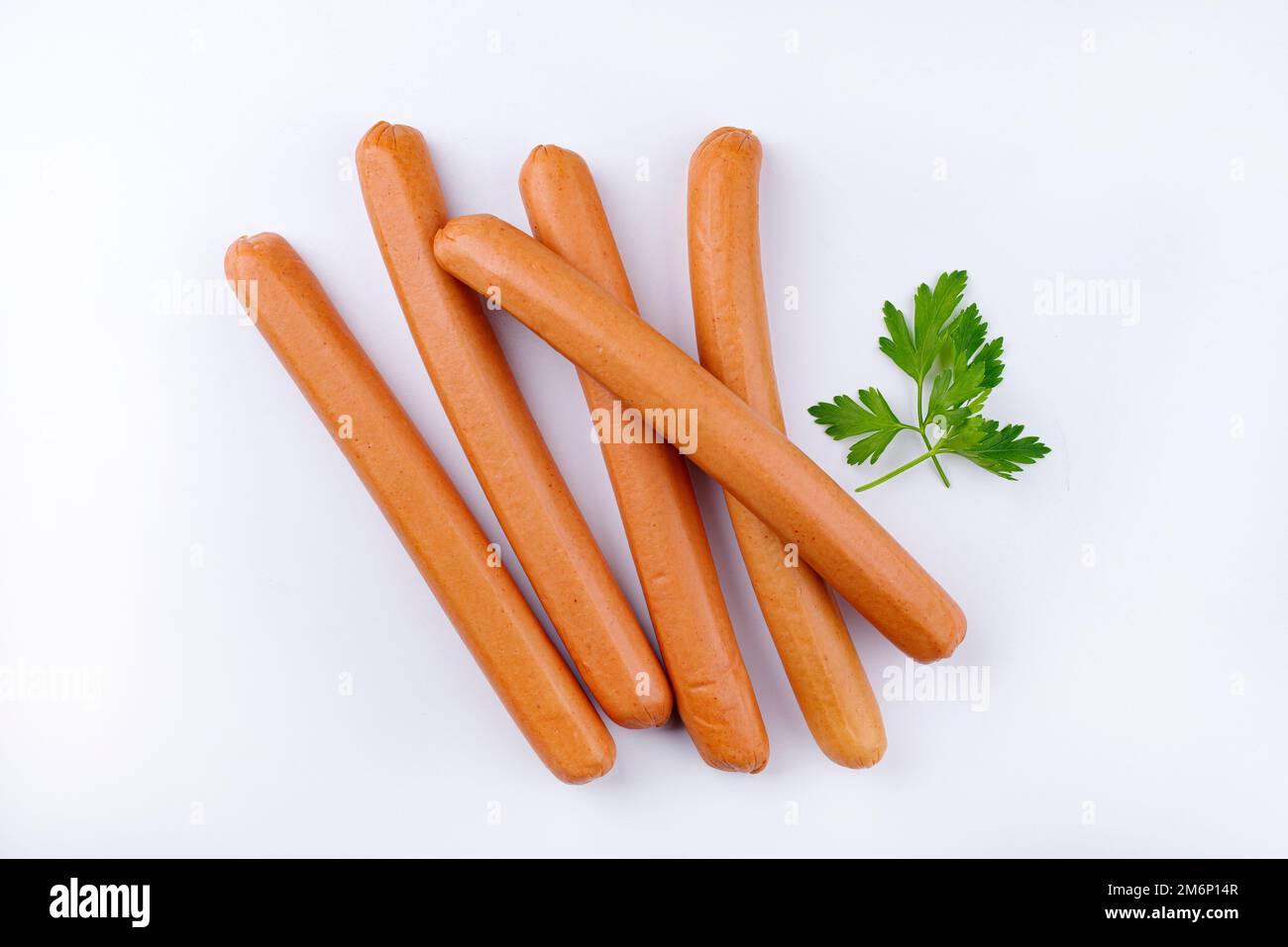 Traditional raw German bockwurst offered as top view on white ...