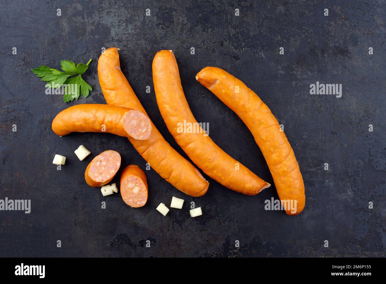 Traditional raw Austrian fine cheese krainer with cheese offered as top ...