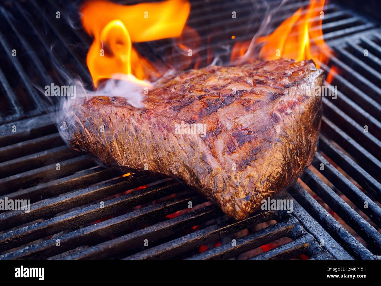 BBQ dry aged wagyu sirloin cap of rump beef steak grilled as close-up ...
