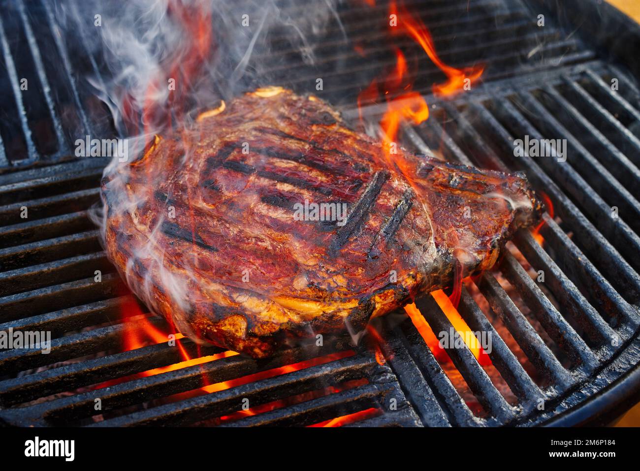 Barbecue dry aged Wagyu cote de boeuf steak grilled as close-up on a ...