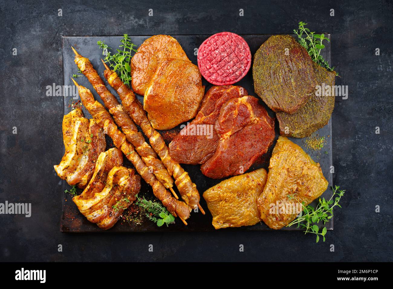 Traditional raw grill platter with hamburger Stock Photo - Alamy