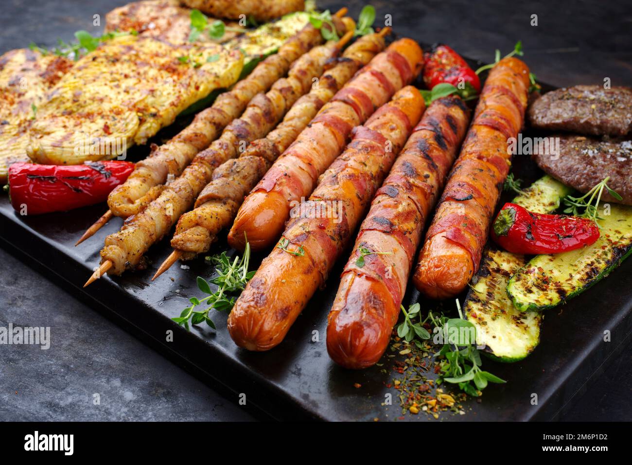 Traditional grill platter with bratwurst Stock Photo - Alamy