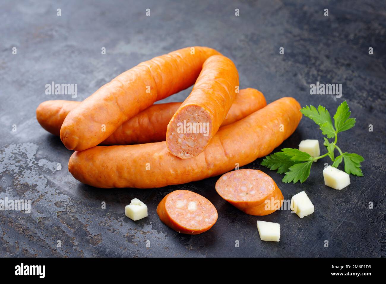 Traditional raw Austrian fine cheese krainer with cheese offered as ...