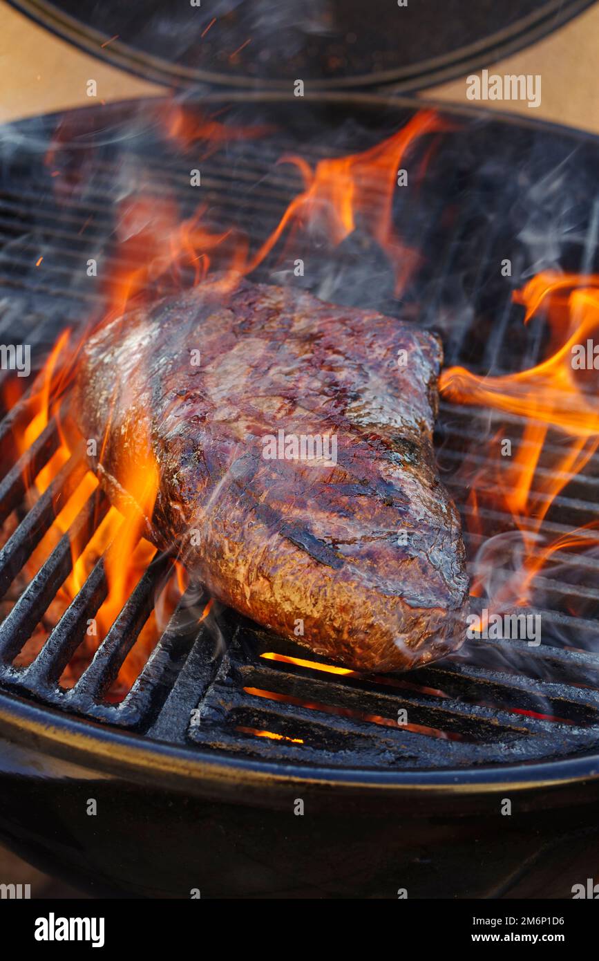 BBQ dry aged wagyu sirloin cap of rump beef steak grilled as close-up ...