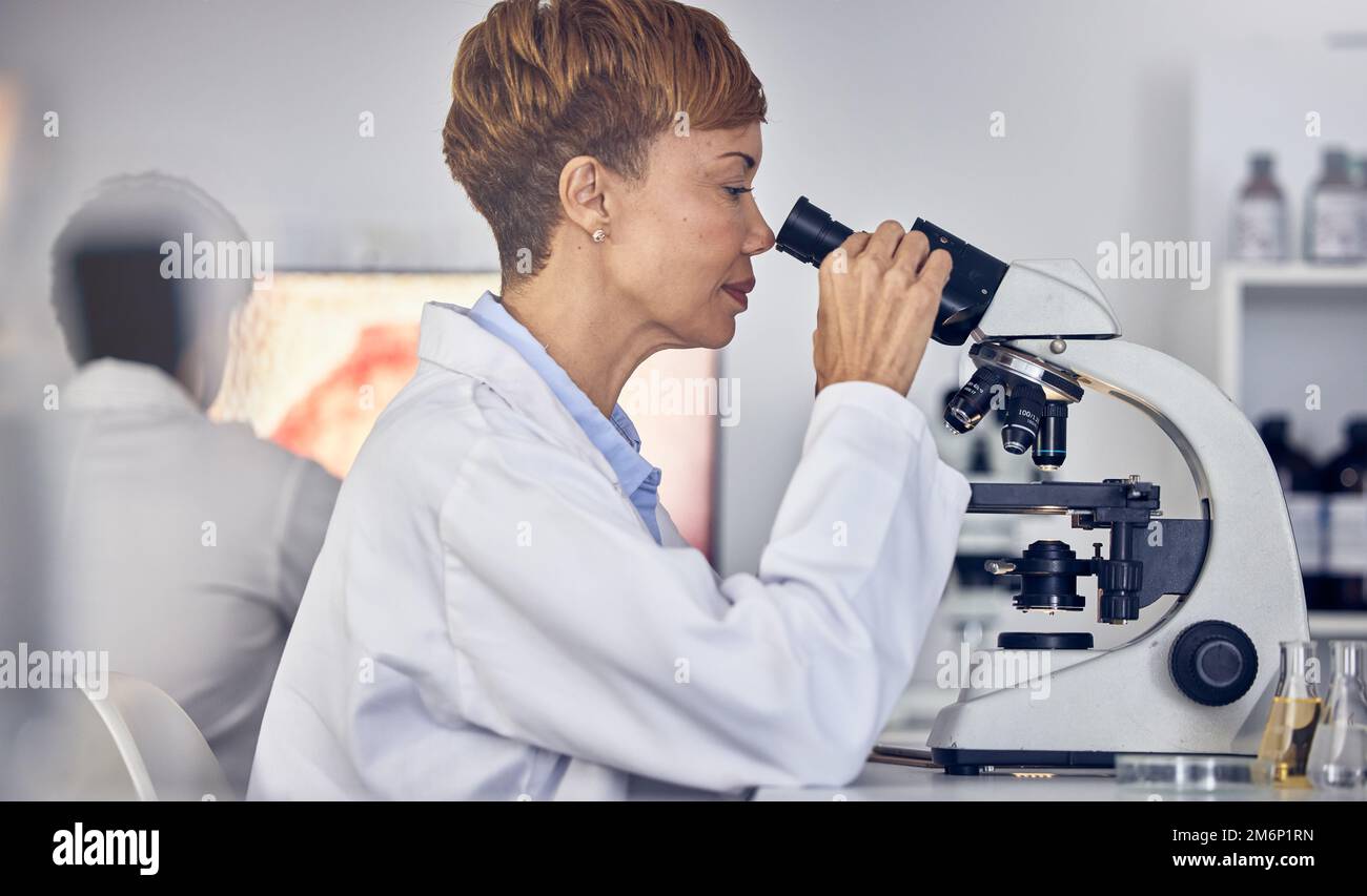 Science, laboratory and black woman with microscope, research for ...