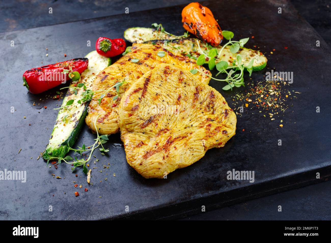 Traditional barbecue turkey escalope filets in curry marinade with ...