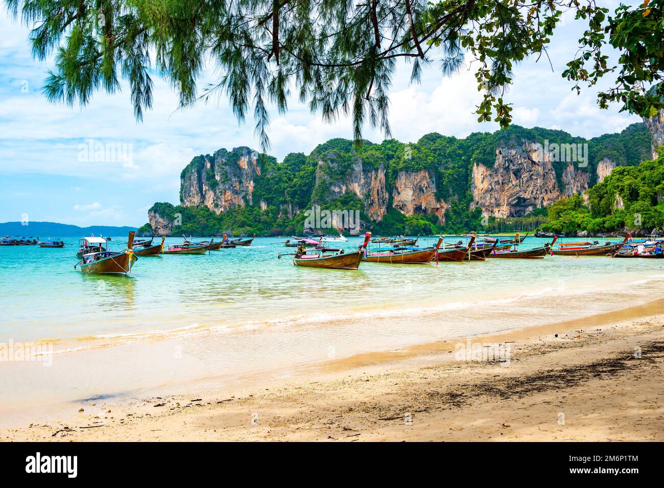 Long tail boats at Railay beach, Krabi, Thailand. Tropical paradise ...