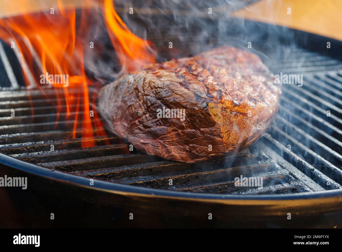 BBQ dry aged wagyu sirloin cap of rump beef steak grilled as close-up ...