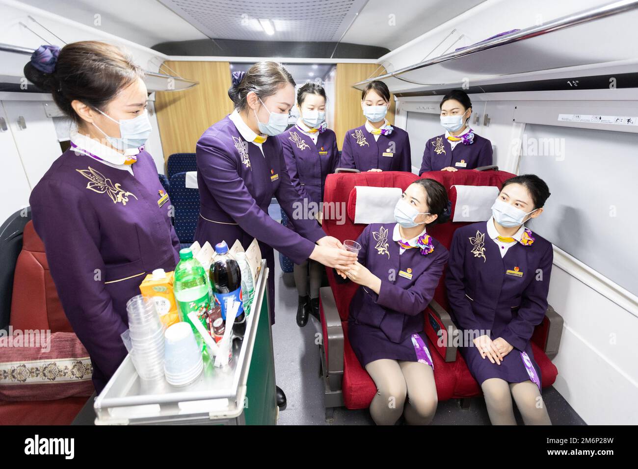 NANJING, CHINA - JANUARY 5, 2023 - High-speed train attendants receive ...