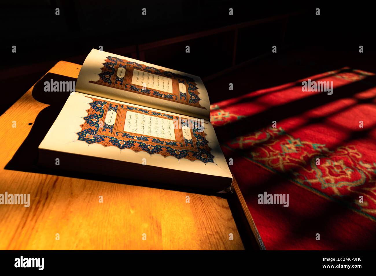 Islamic background photo. First pages of Quran on the lectern in the ...