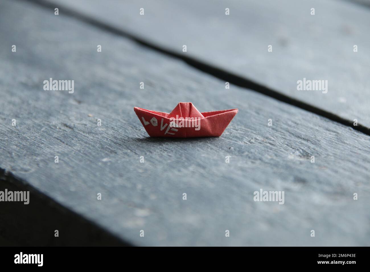 Valentines day background or birthday background. Paper boat with the ...