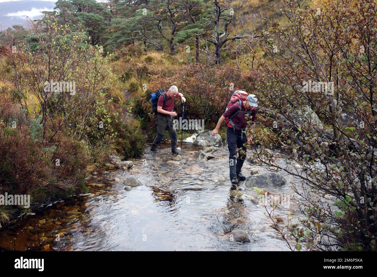 Two Men Walking Across River from Callop on Route to the Scottish ...
