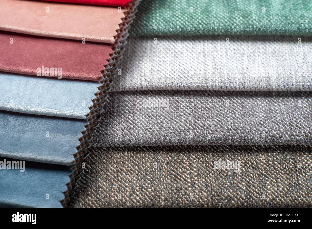 Bright collection of colorful textile samples. Fabric swatches, set in ...