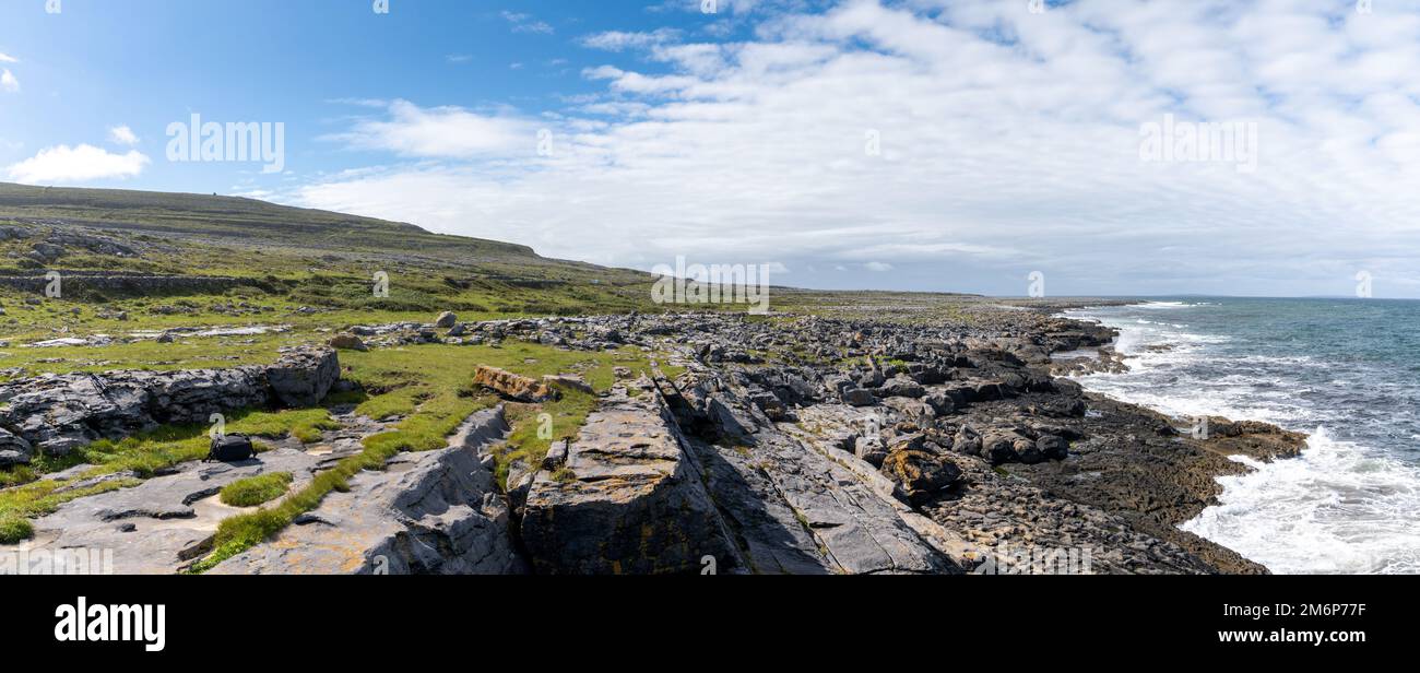 A panorama view of the glaciokarst coastal landscape of the Burren ...