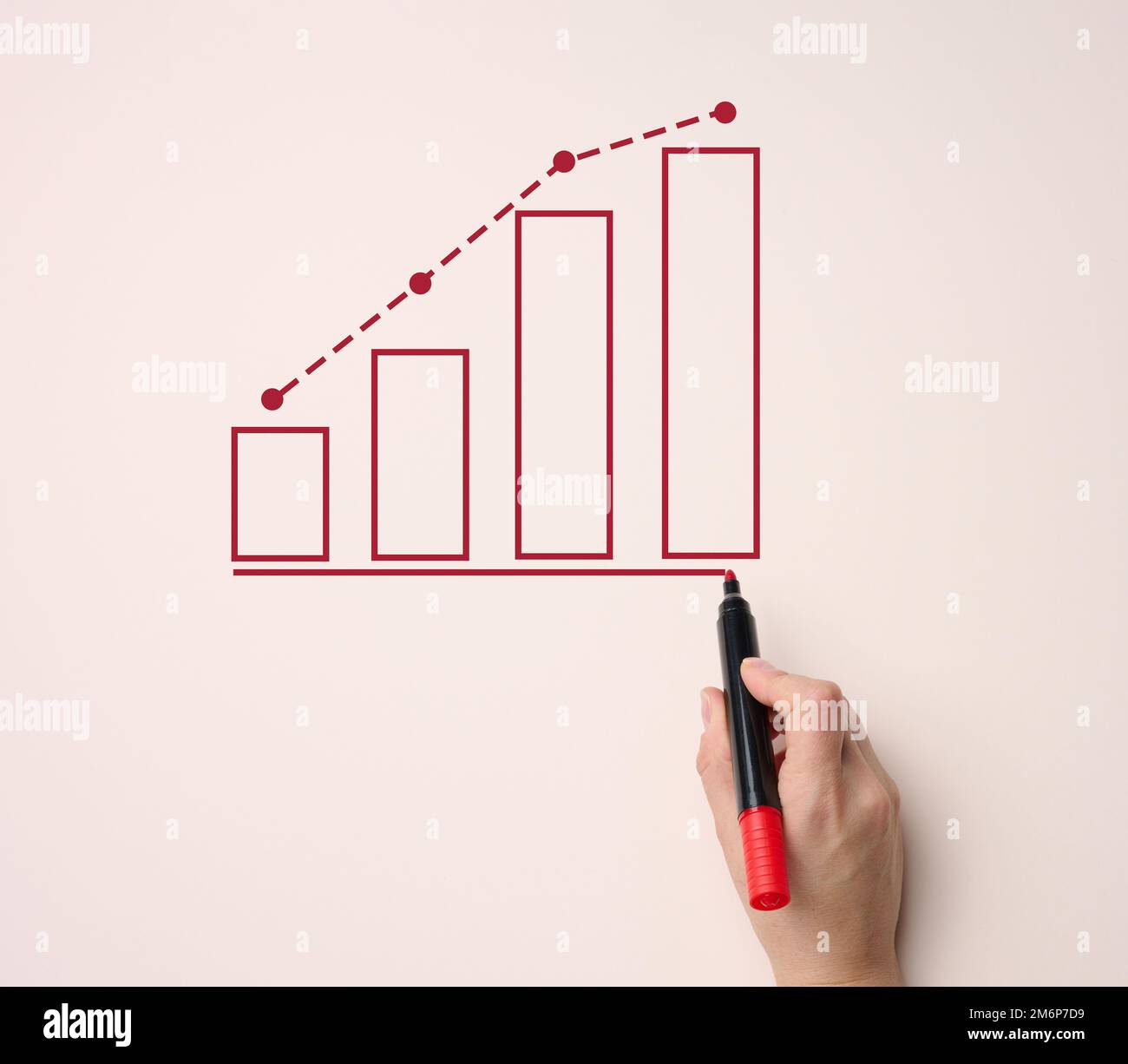 Graph with growing indicators and a female hand with a marker on a ...