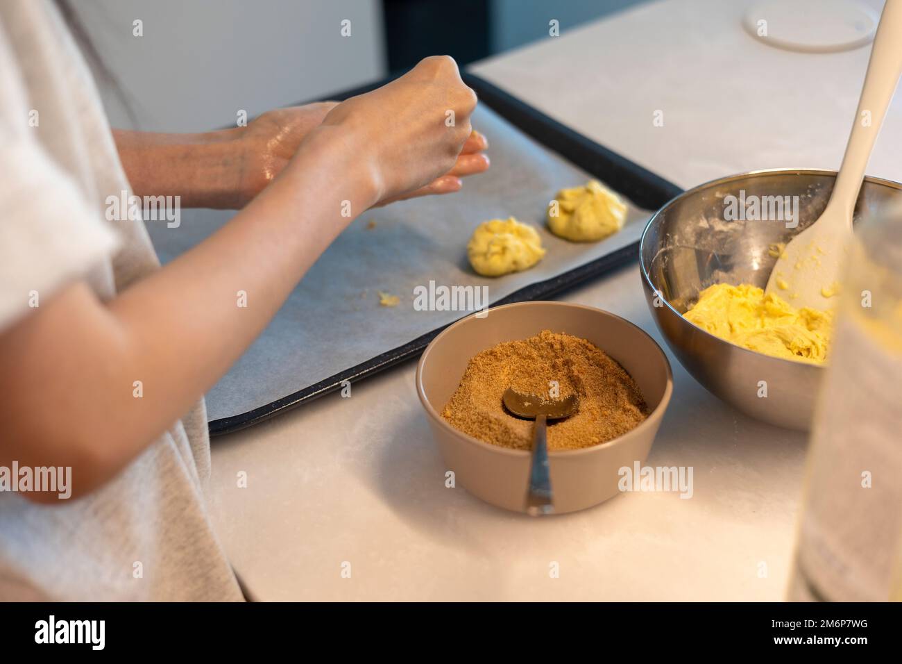 Making cookie bread with sugar before baking, shape dough into a ball ...