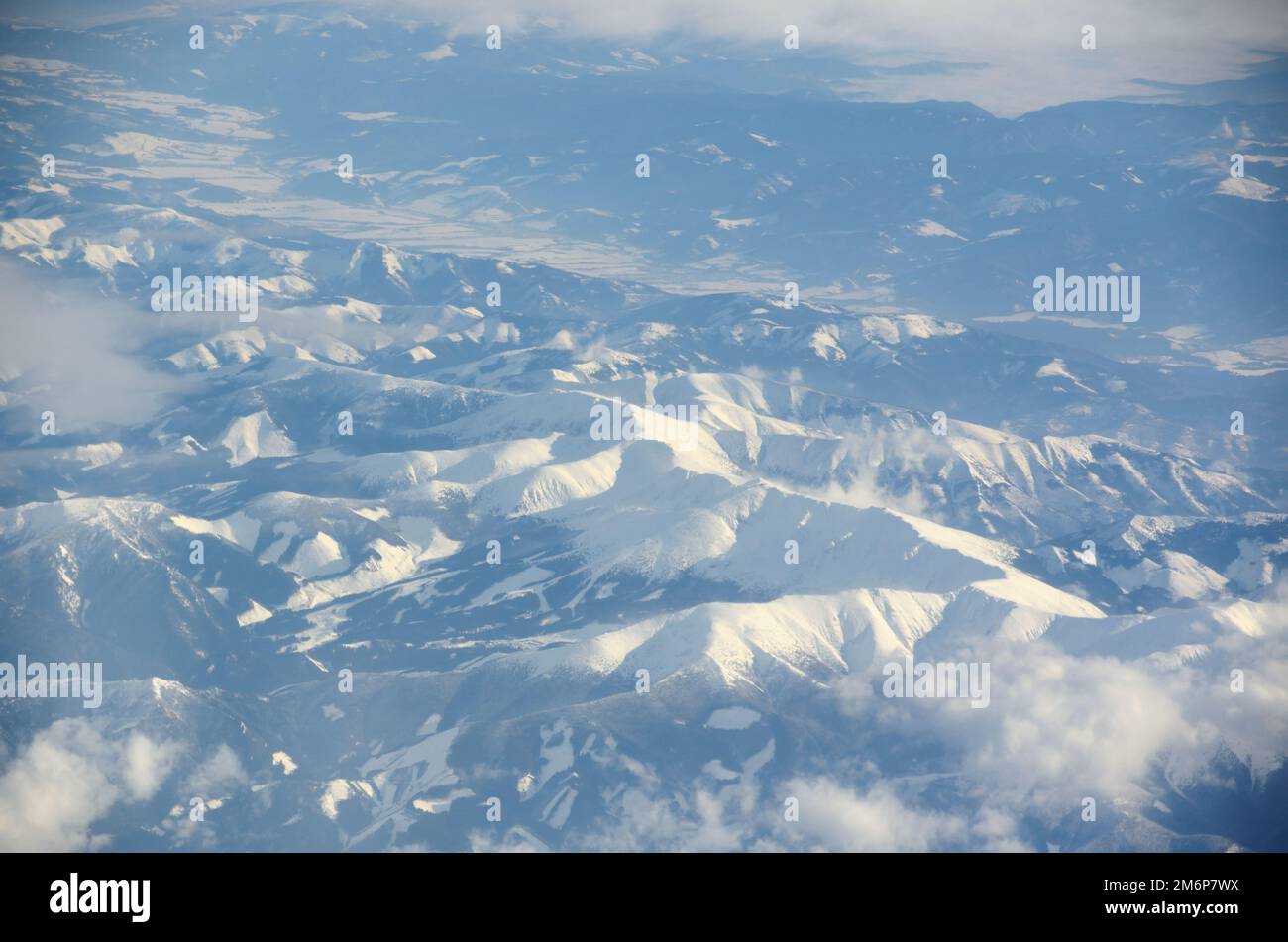 Bird Eye view of Alps in winter Stock Photo - Alamy