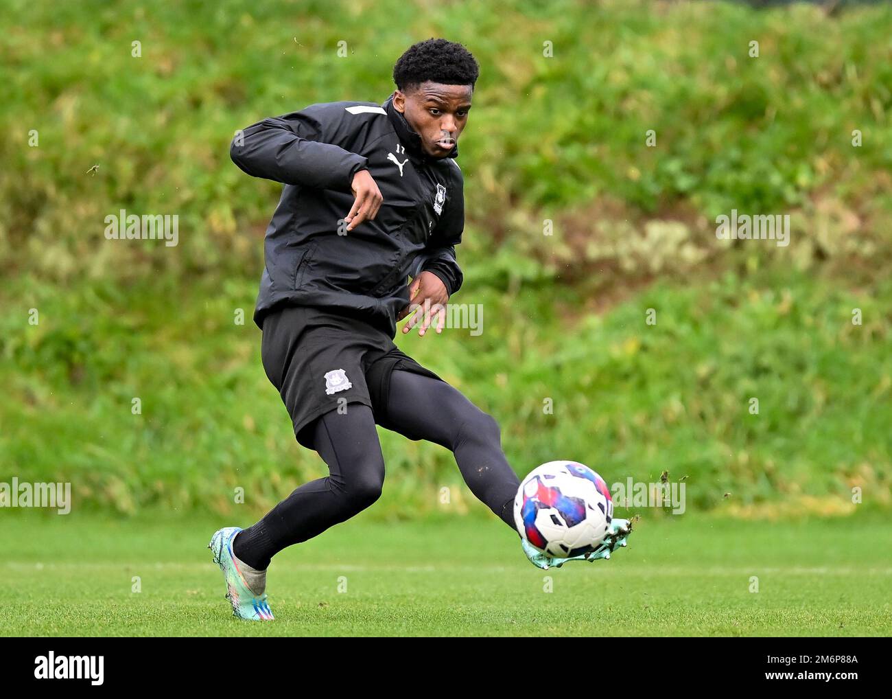 Plymouth Argyle full back Bali Mumba (17) crosses the ball during the ...