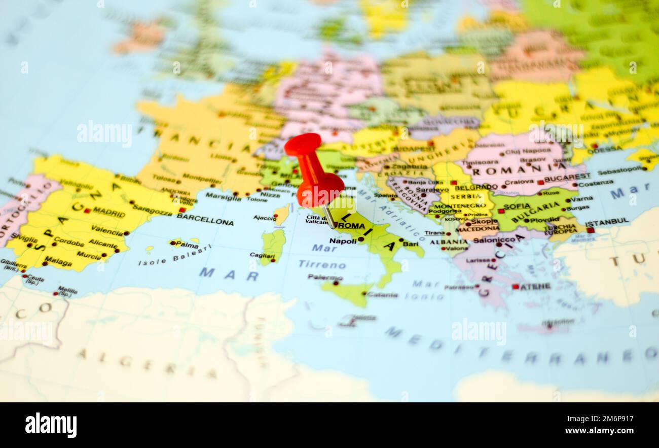 Red push pin pointing at Rome, Italy, on a map of europe Stock Photo ...