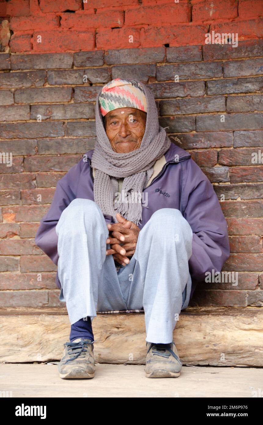 Faces of Nepal - Mature Men wearing Nepali topi Stock Photo - Alamy