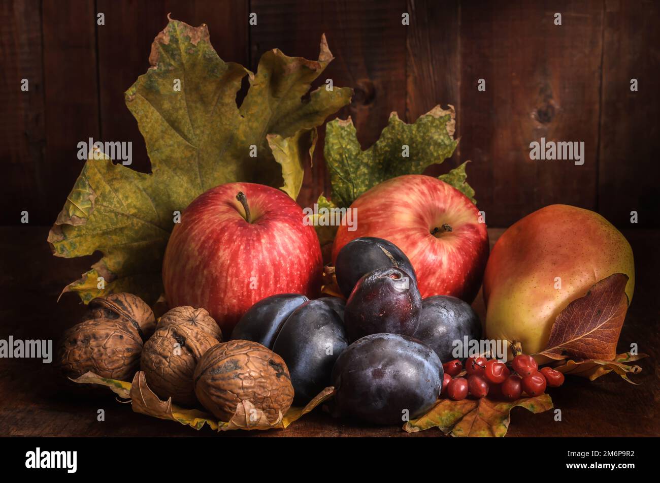Fruits in bulk on a dark wooden background in a rustic style Stock ...