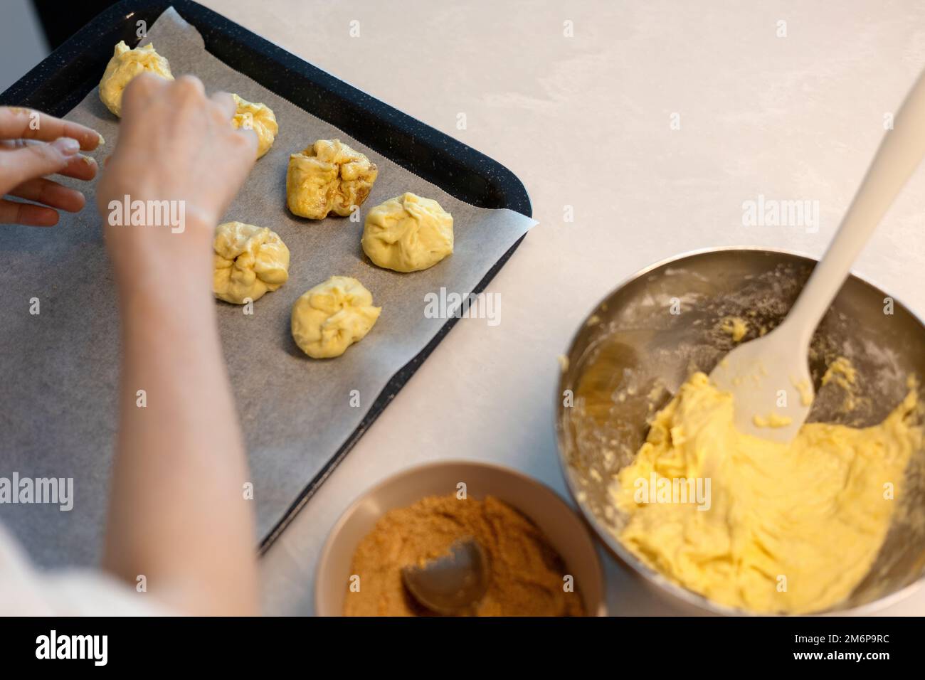 Making cookie bread with sugar before baking, shape dough into a ball ...