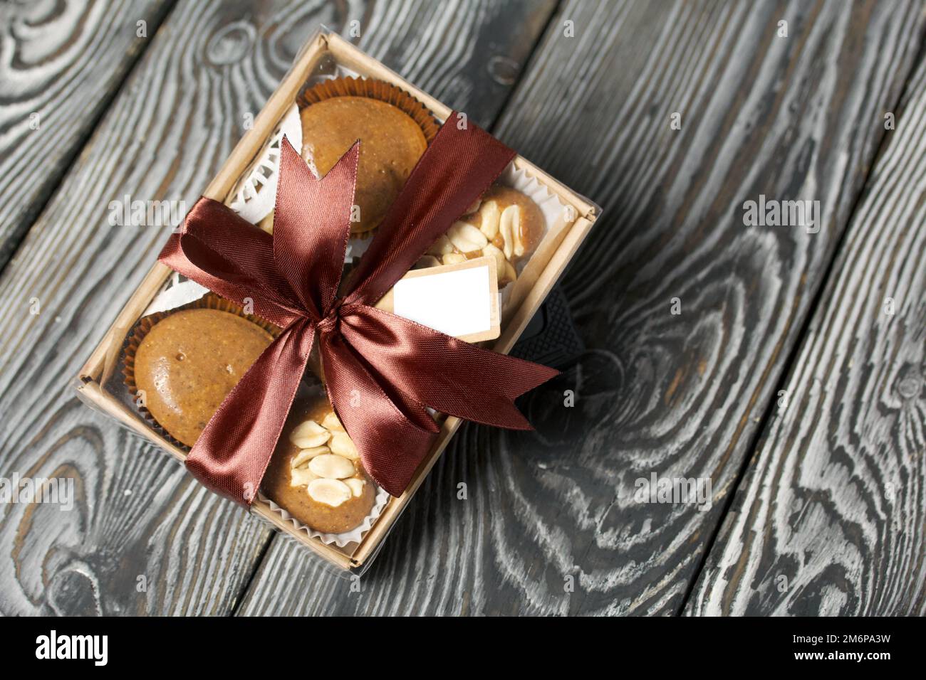 Homemade caramel. Brown caramel candies. Creamy sweets with peanuts. On ...