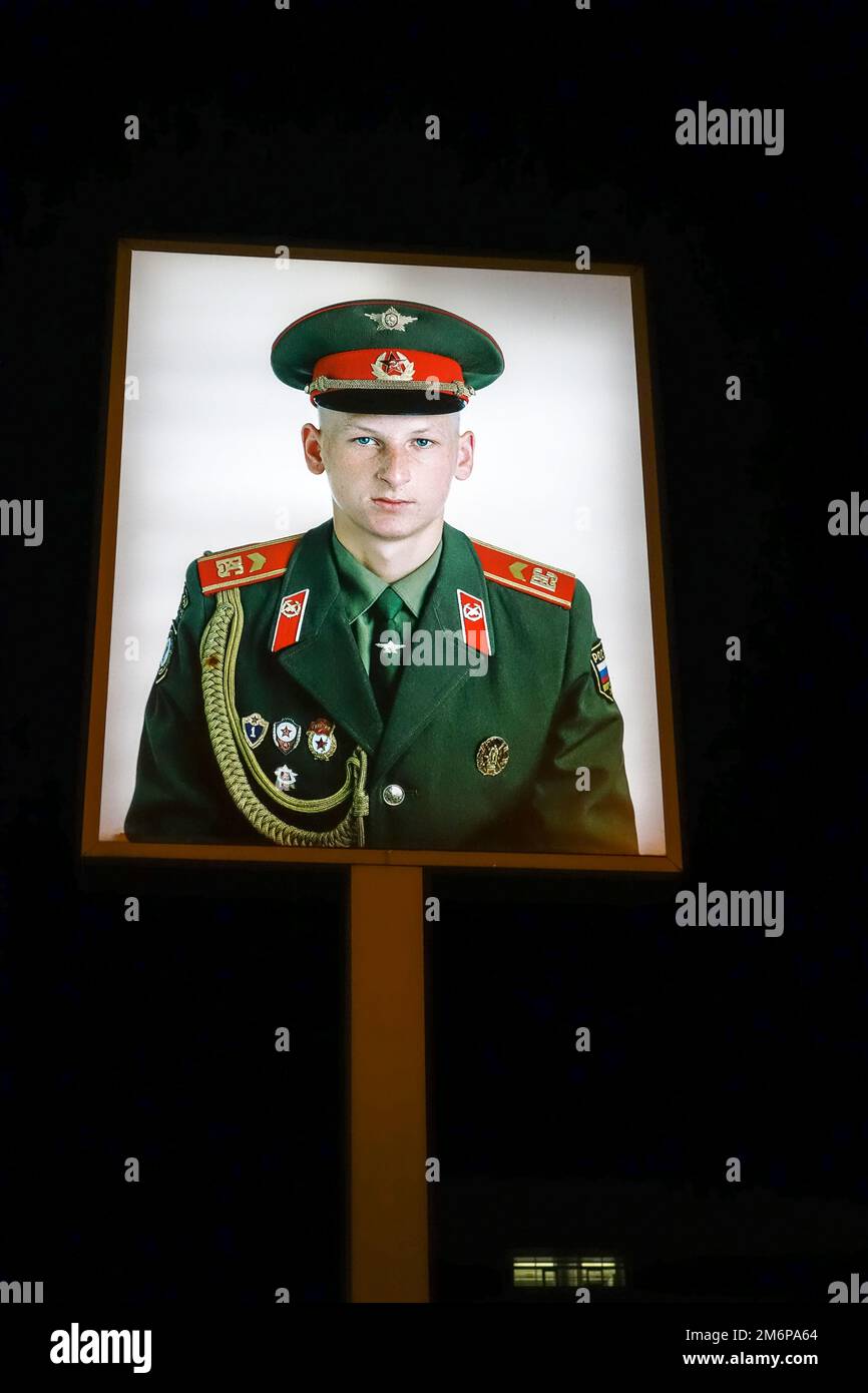 Berlin Germany, 2014. Illuminated photograph of a Soviet soldier at ...