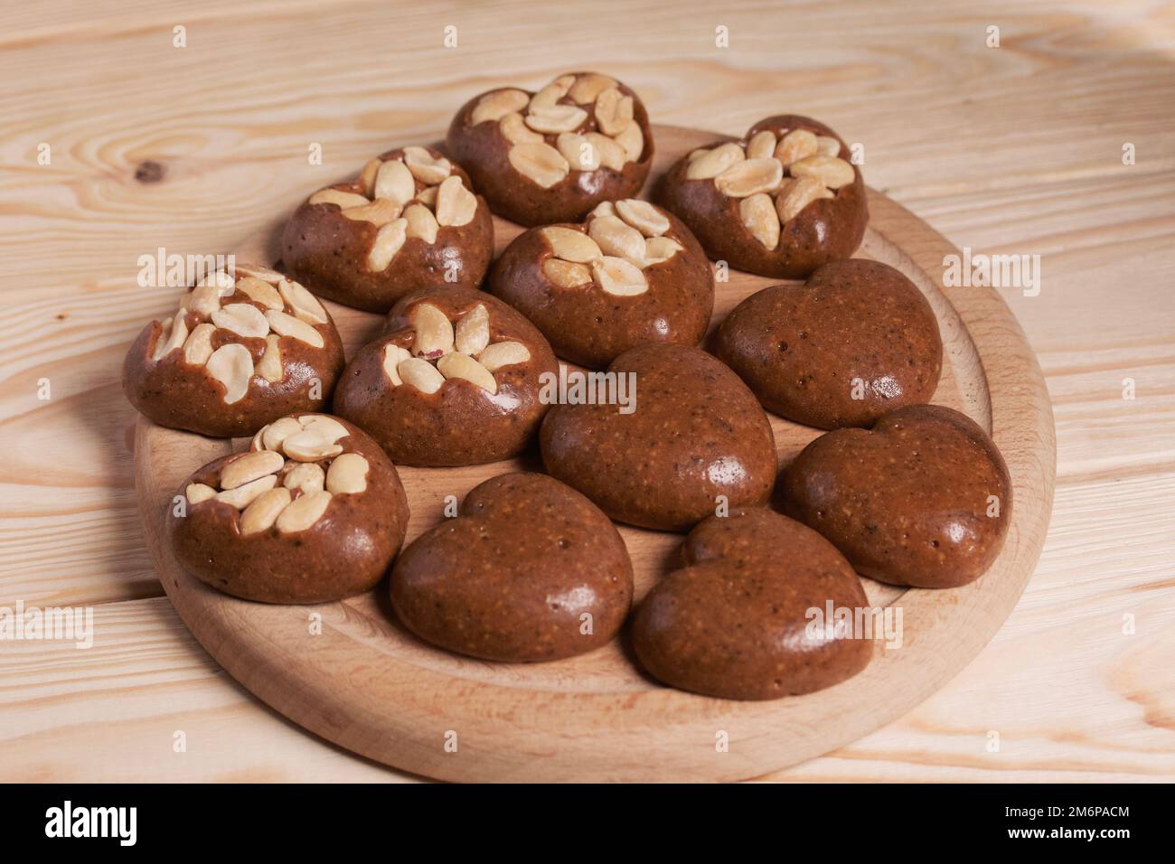 Homemade caramel. Brown caramel candies. Creamy sweets with peanuts. On ...
