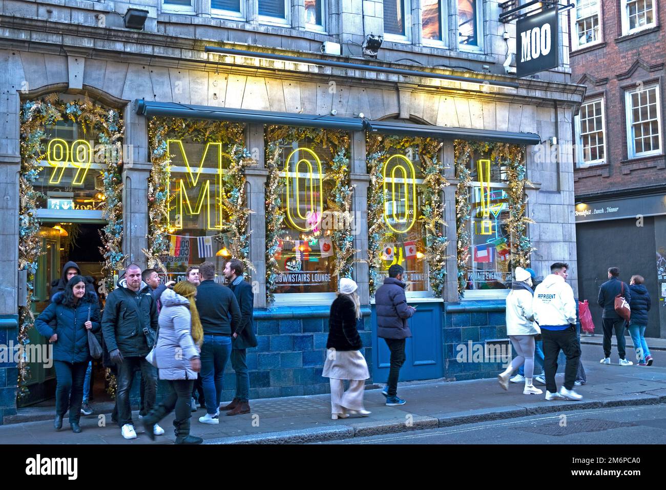 Moo Steakhouse exterior on Wardour Street at Christmas people outside ...